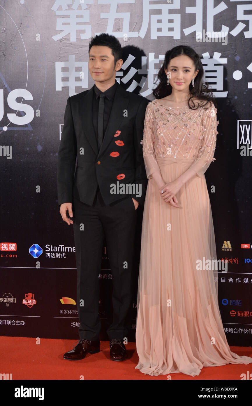 Chinese actress Yang Mi, right, and actor Huang Xiaoming pose at the ...