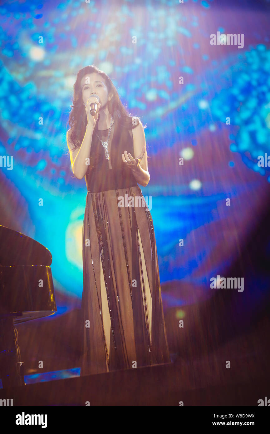 Hong Kong singer Karen Mok performs during the award ceremony for the ...