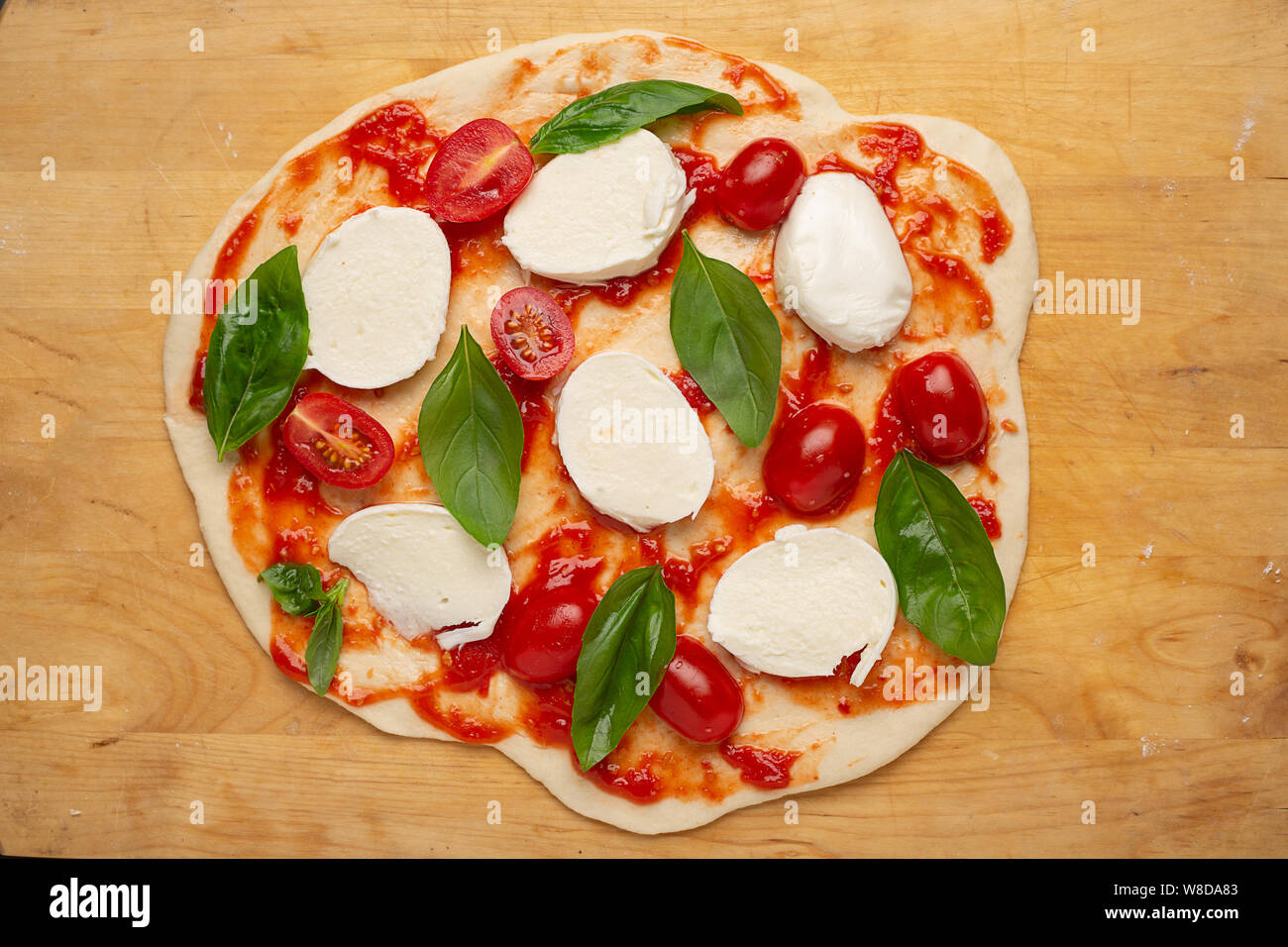 Pizza before its cooked hi-res stock photography and images - Alamy