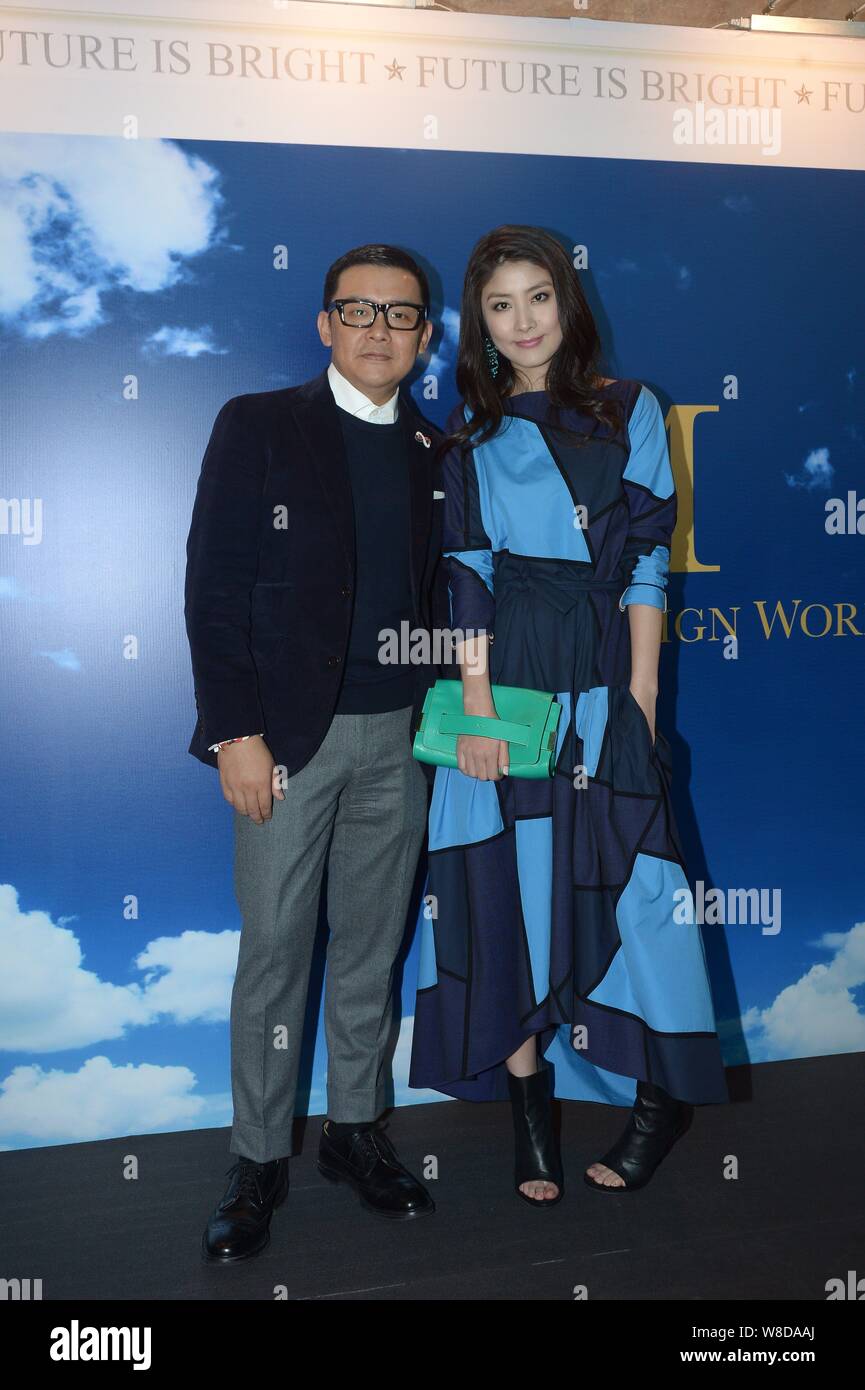 Hong Kong singer and actress Kelly Chen, right, poses with music ...
