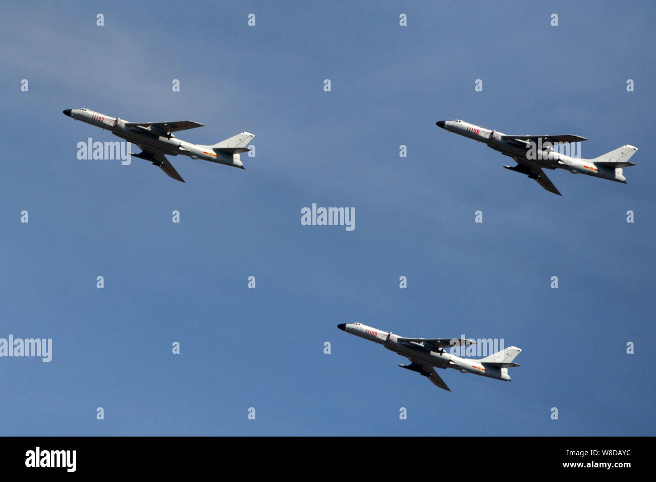 Bombers of PLA's (People's Liberation Army) Air Force fly in formation ...