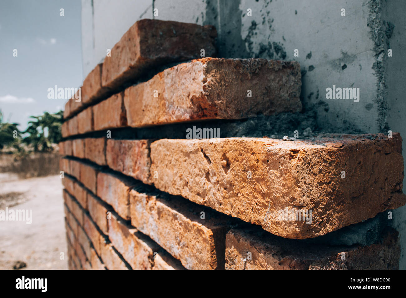 Construction of a brick wall Stock Photo - Alamy