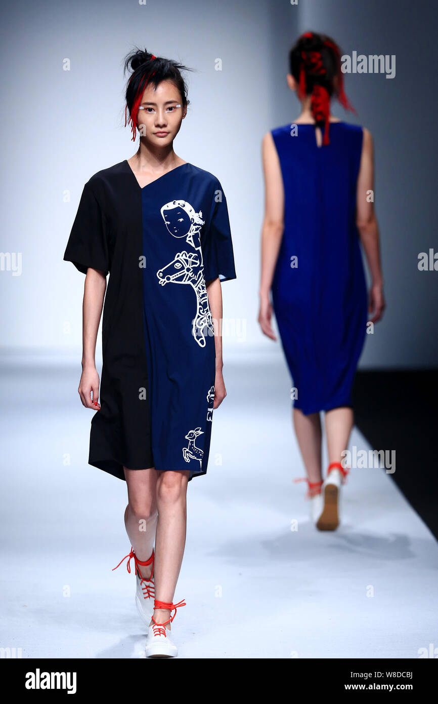 Models display new creations at the "Su.GuangYu x Pepsi" fashion show ...