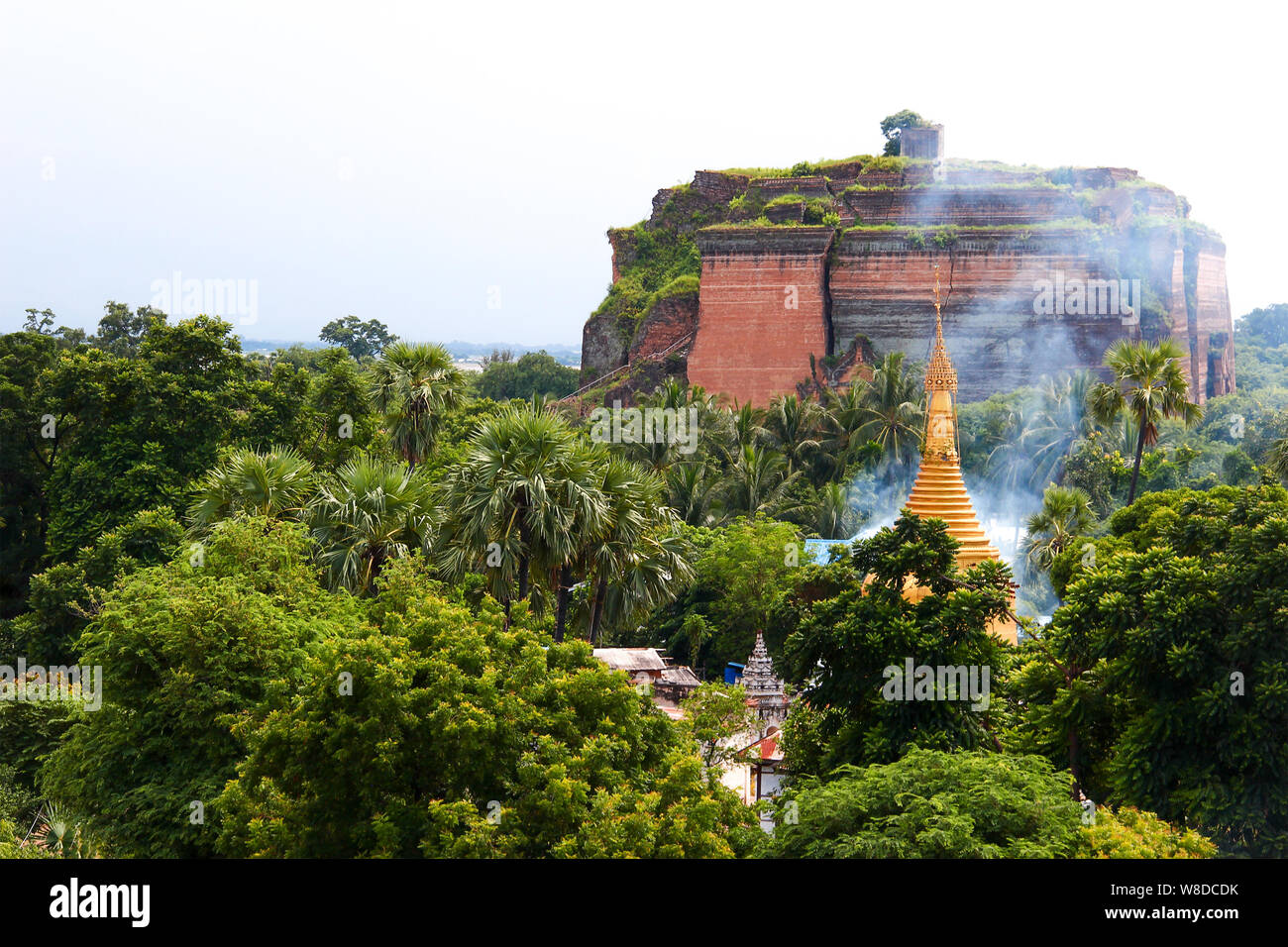 Smoke over golden pagoda in the forest at the "Mingun Pahtodawgyi ...