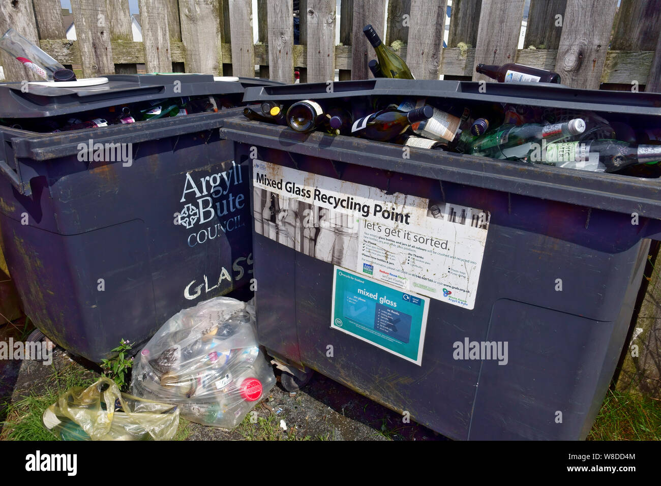 Full recycling bins Stock Photo - Alamy