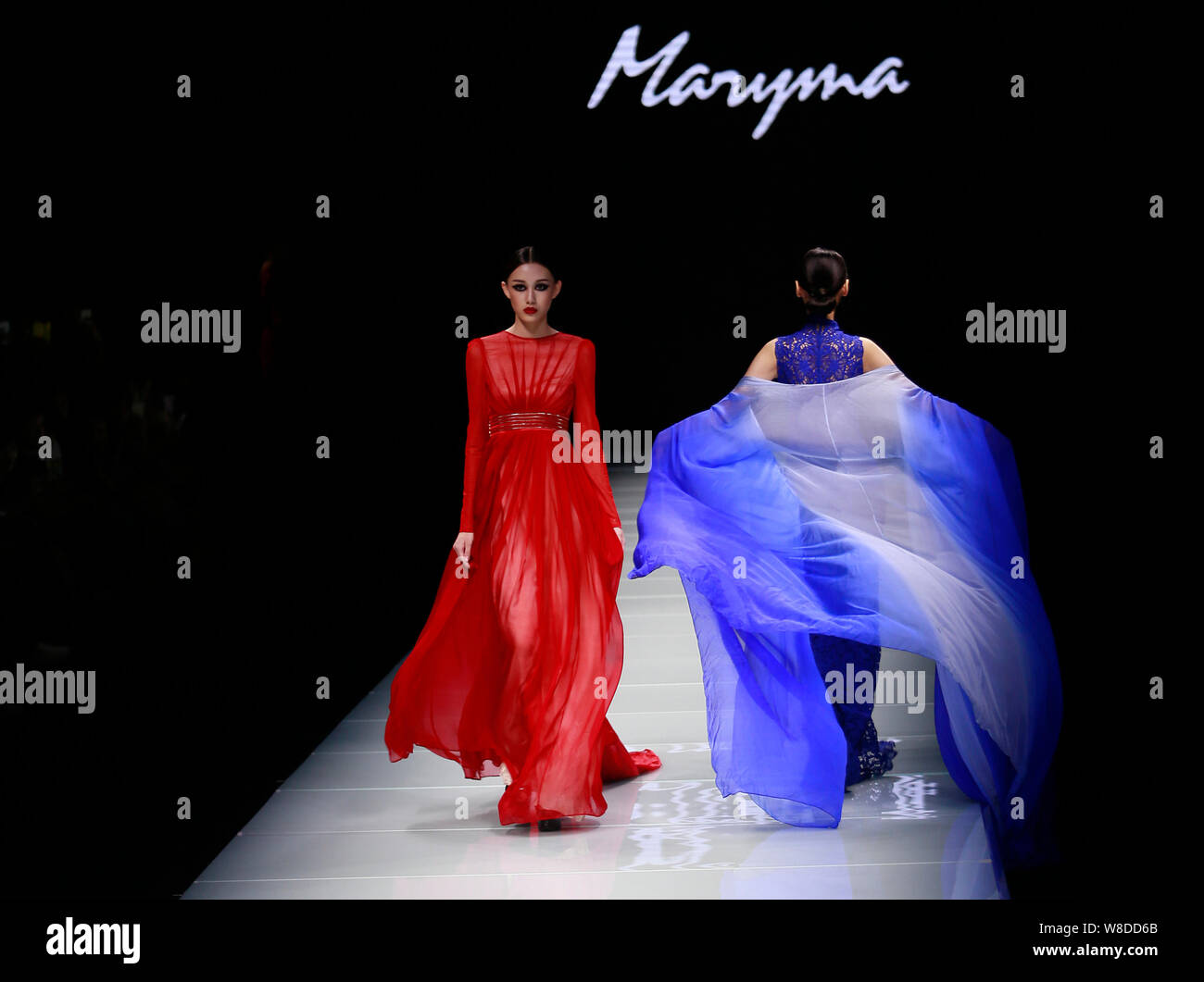 Models display new creations by Chinese fashion designer Mary Ma in the ...