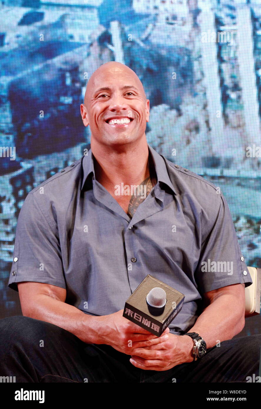 American actor Dwayne Johnson reacts during a press conference for his ...
