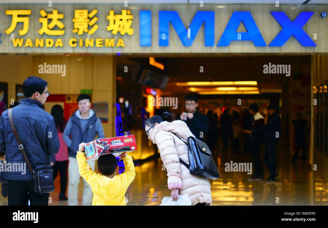 --FILE--Moviegoers are seen at a Wanda Cinema featuring IMAX in Yichang ...
