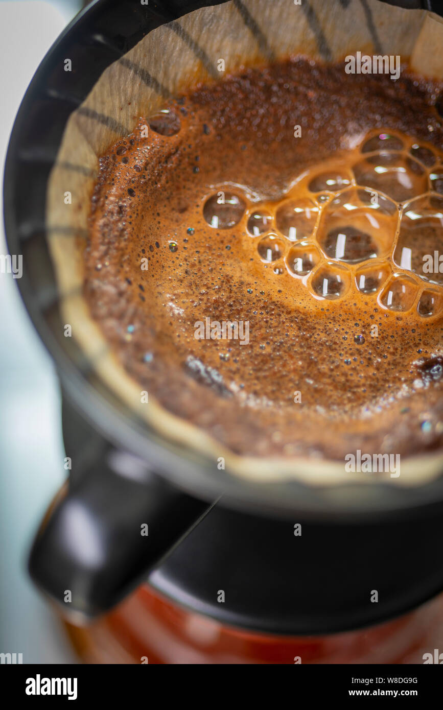 The first step The Pre-Brew (The Bloom) of the pour over drip coffee ...