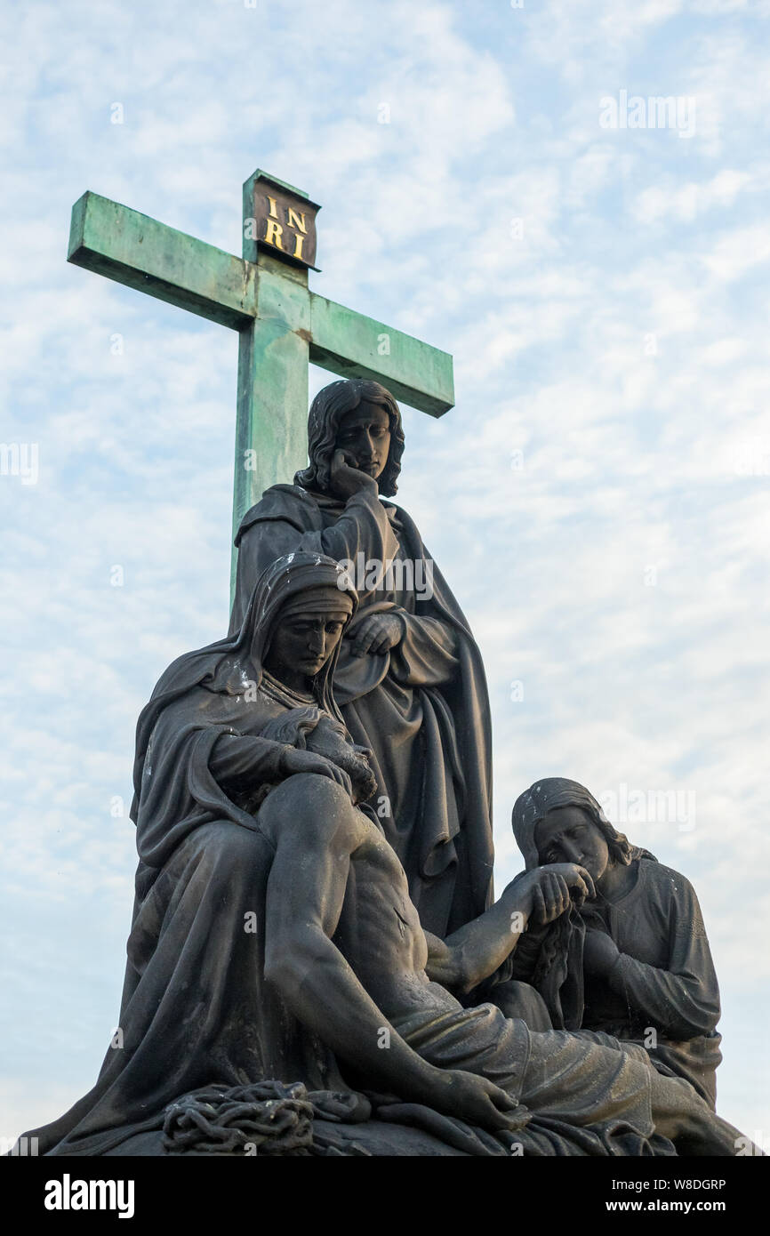 Pieta, Lamentation of Christ statue on Charles Bridge in Prague, Czech ...
