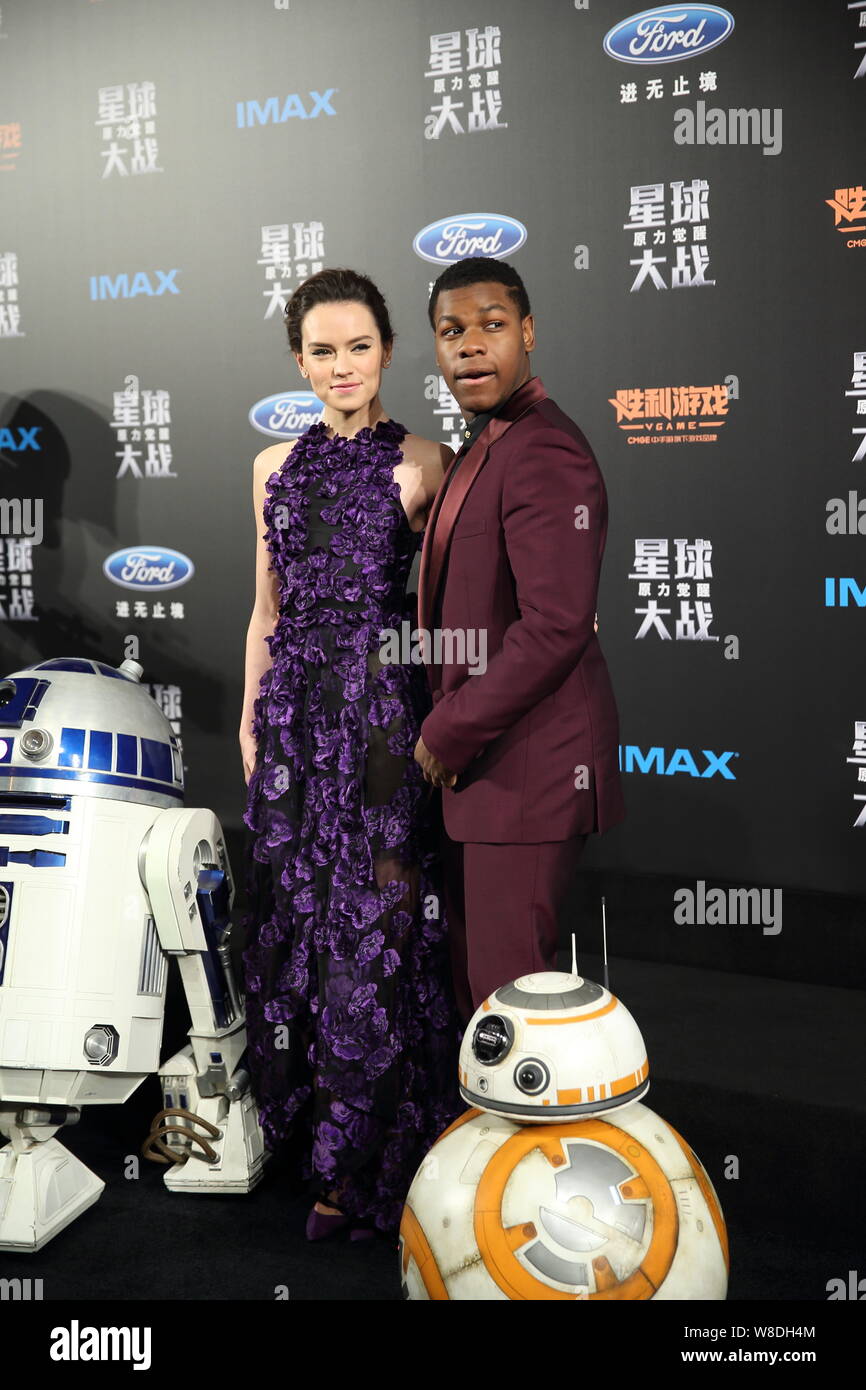 English actress Daisy Ridley and actor John Boyega pose during a ...