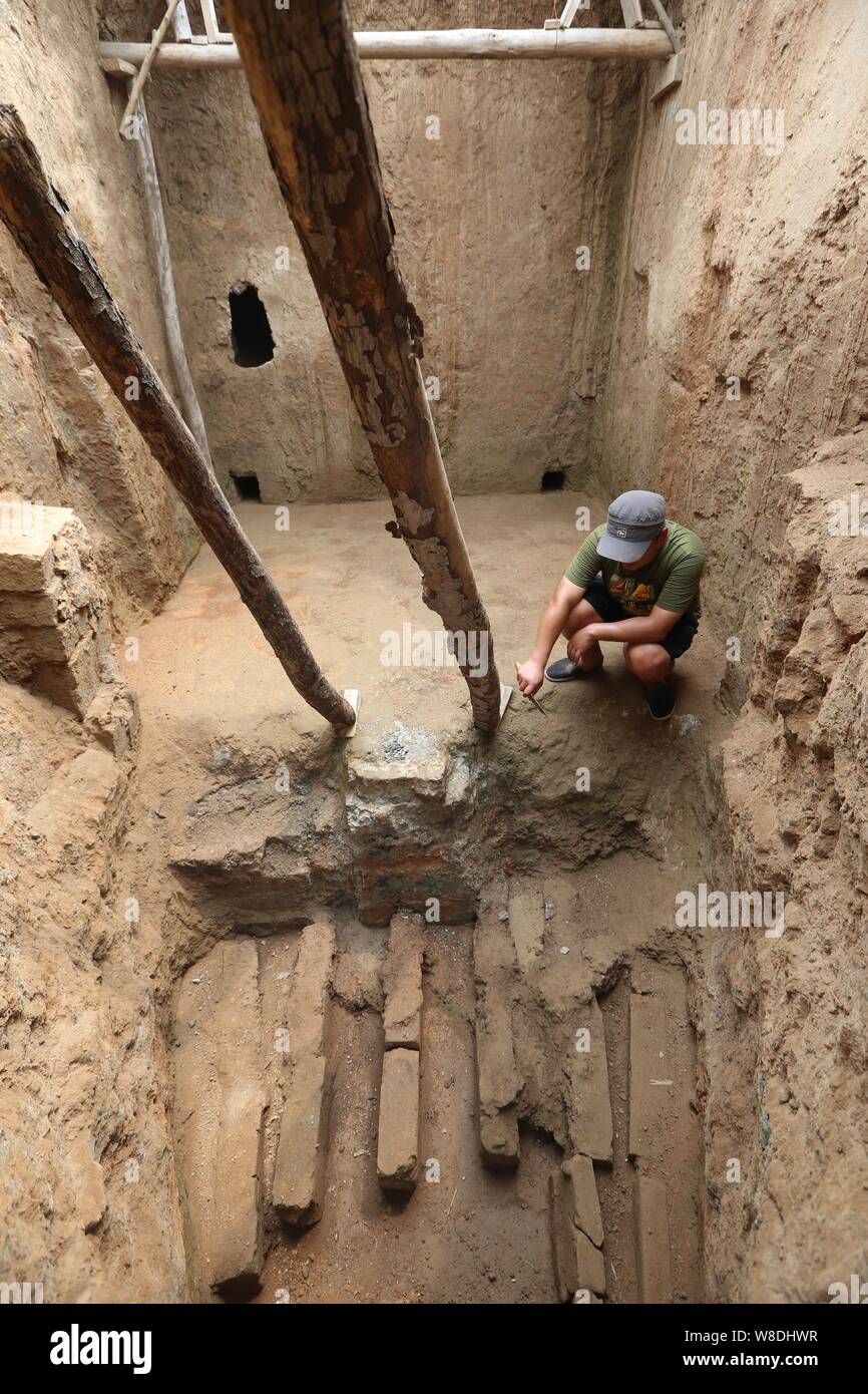 A Chinese archaeologist excavates the ancient kilns of the Eastern Han ...