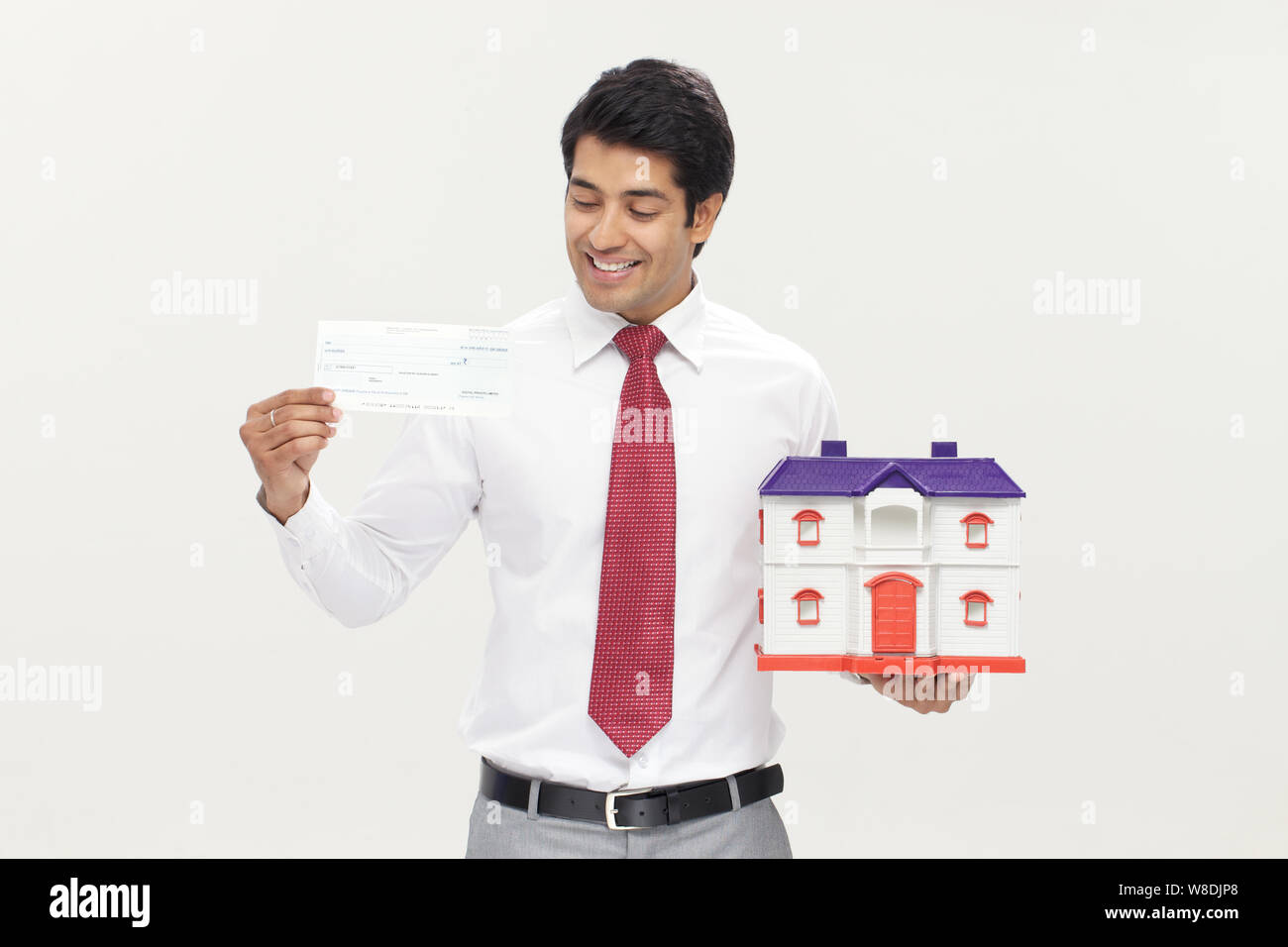 Man holding cheque hi-res stock photography and images - Alamy
