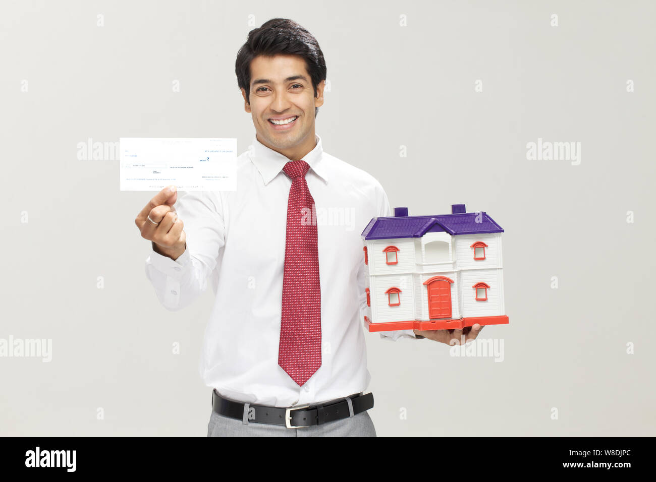 Man holding cheque hi-res stock photography and images - Alamy