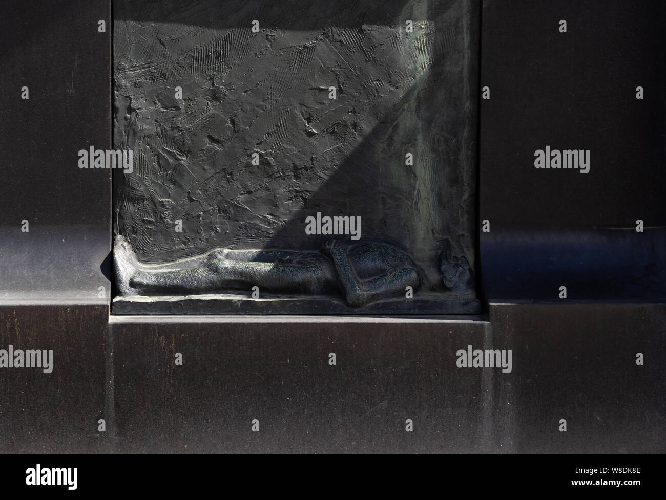 Oslo Norway - 22 june 2019: Relief of lying dead old man on wall of the ...