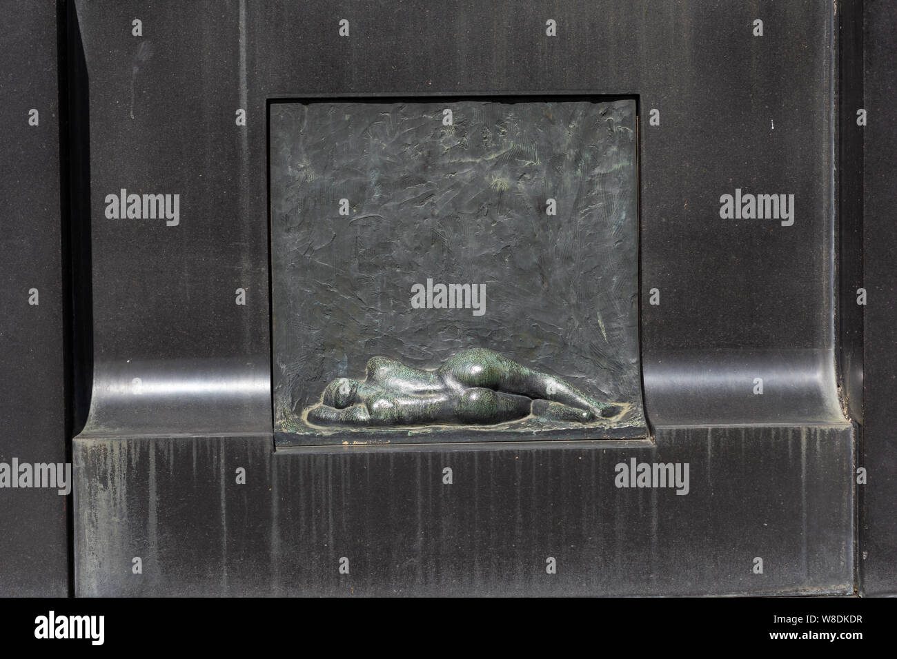 Oslo Norway - 22 june 2019: Relief of man lying on earth on wall of the ...