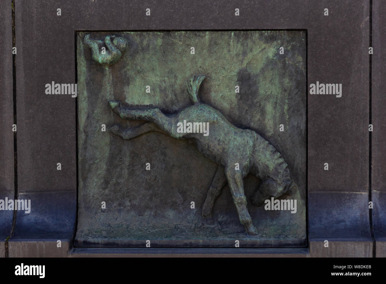 Bronze relief baby and horse hi-res stock photography and images - Alamy