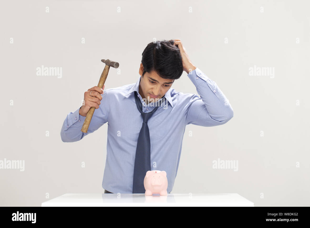 Indian confused businessman hi-res stock photography and images - Alamy