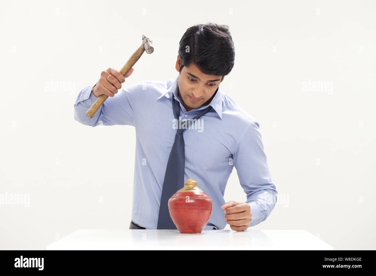 Young man with hammer hi-res stock photography and images - Alamy