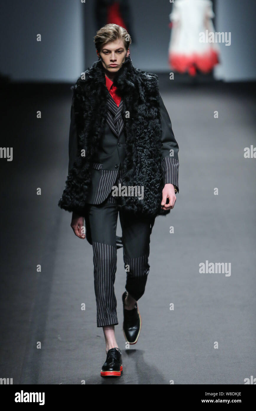 A model displays a new creation by Istituto Marangoni Shanghai Fashion ...
