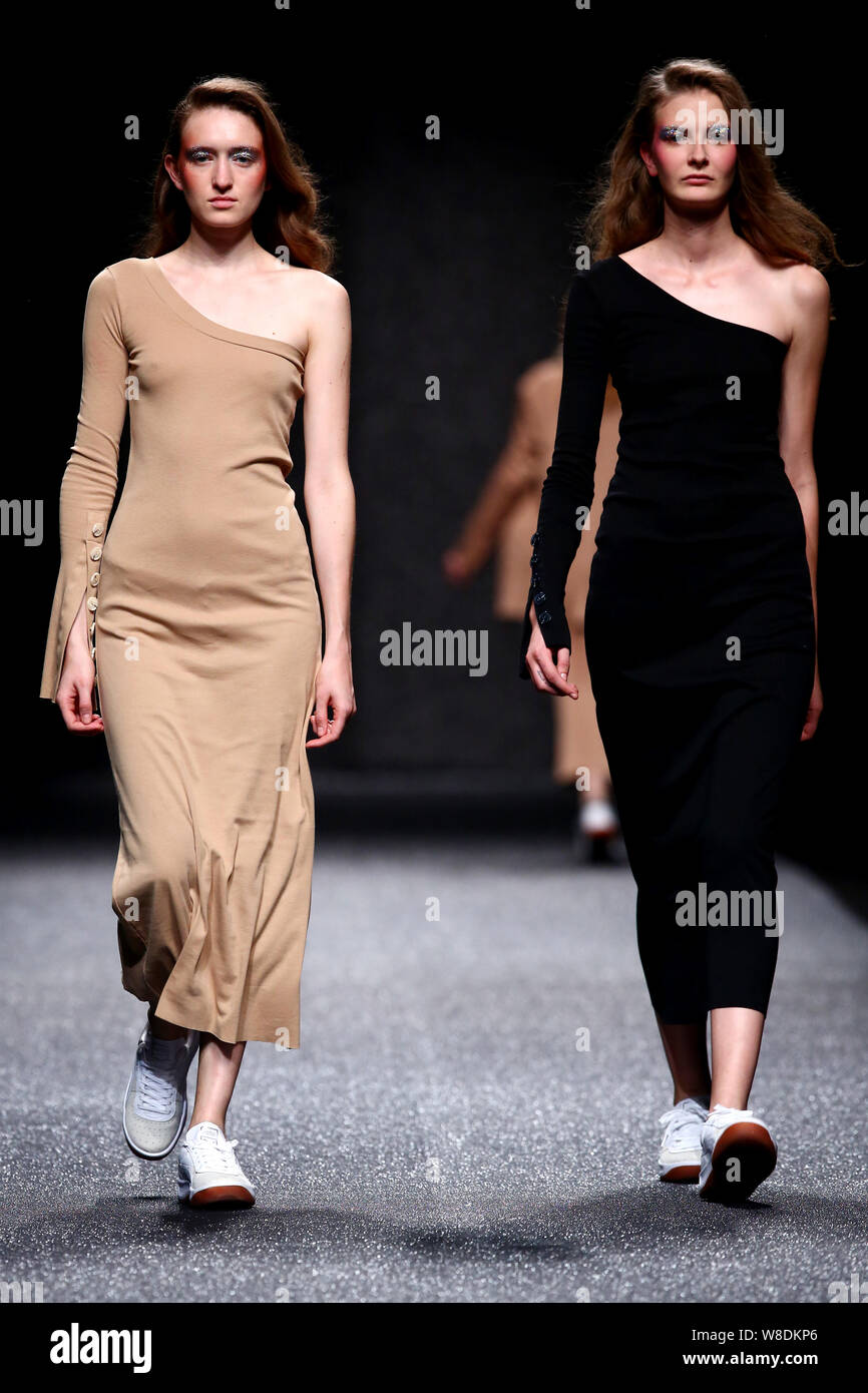 Models display new creations at the Nicole Zhang fashion show during ...