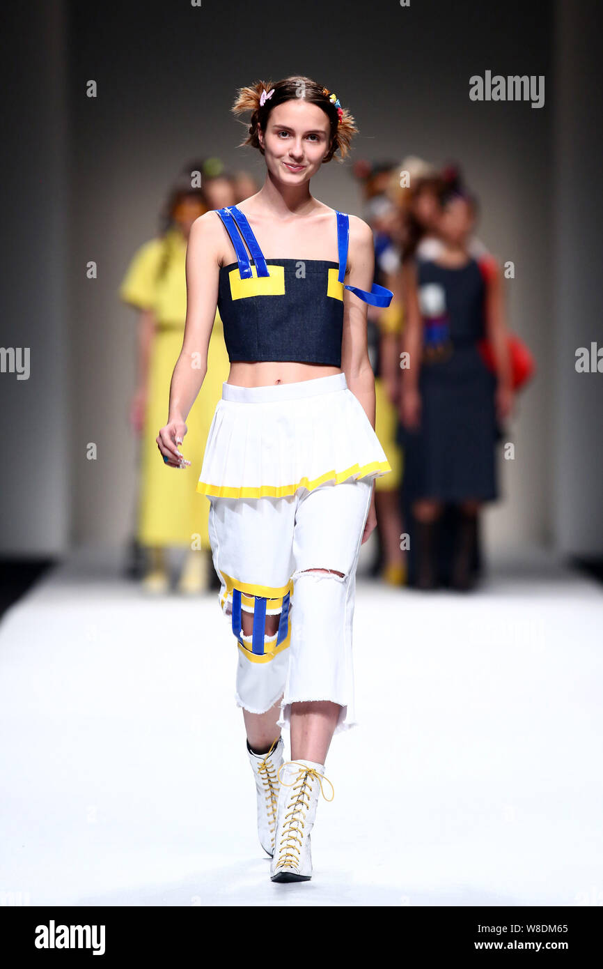 A model displays a new creation by Chinese designer Dong Liang at the ...