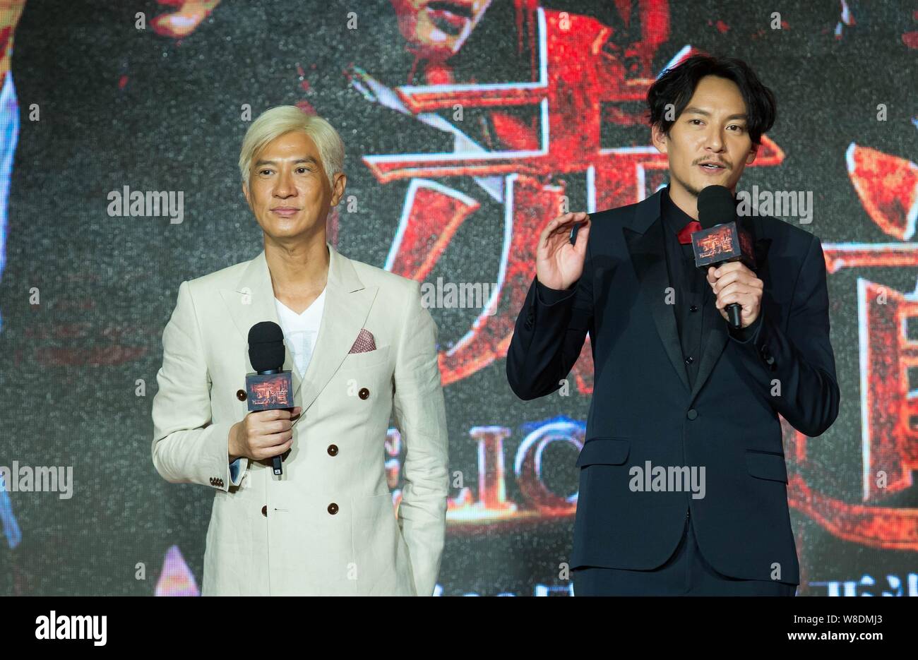 Taiwanese actor Chang Chen, right, speaks next to Hong Kong actor Nick ...