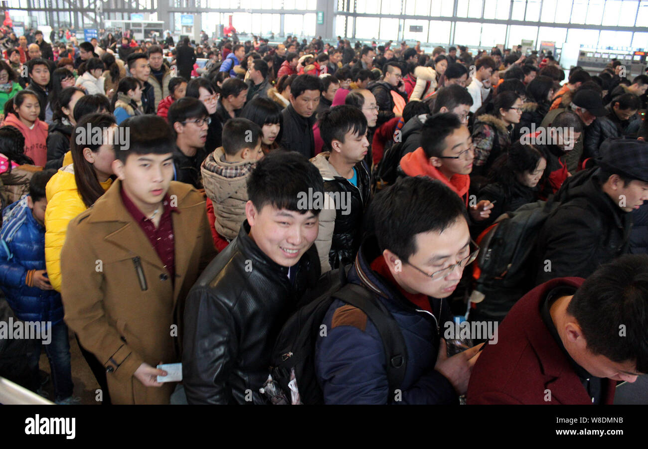 Chinese passengers who return to work from the Chinese Lunar New Year ...