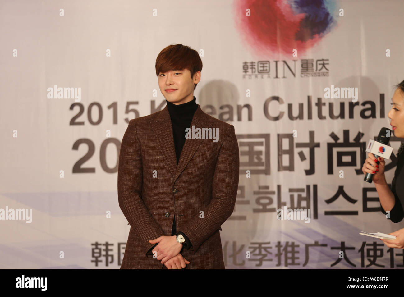 South Korean actor and model Lee Jong-suk poses during a press ...