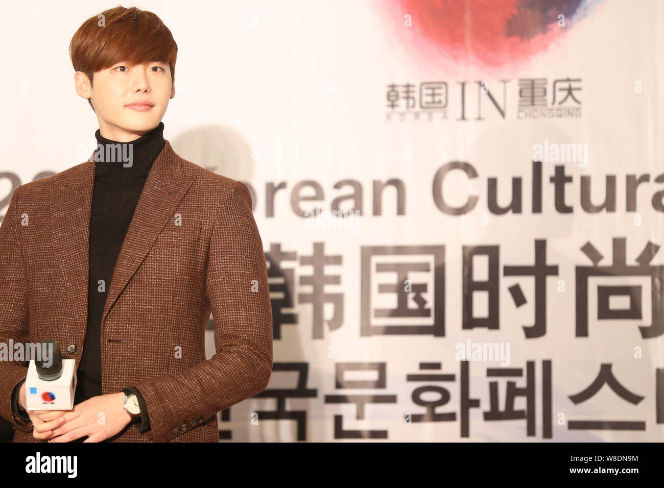 South Korean actor and model Lee Jong-suk poses during a press ...