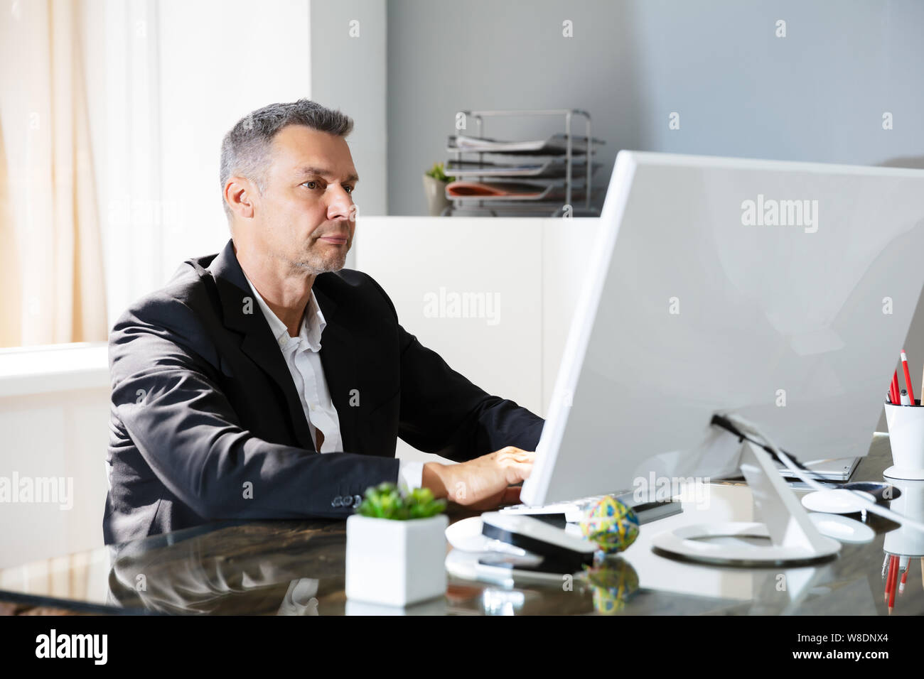 Business person computer suit hi-res stock photography and images - Alamy