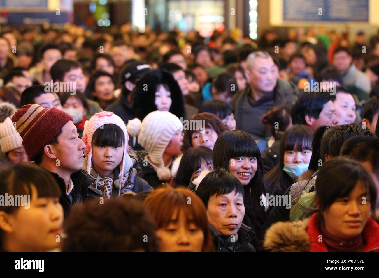 Chinese passengers crowd the Beijing Railway Station as they are going ...