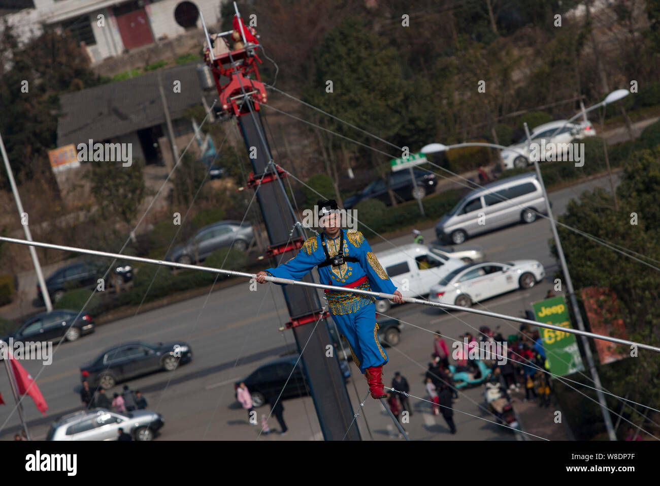 Balancing on pole hi-res stock photography and images - Alamy
