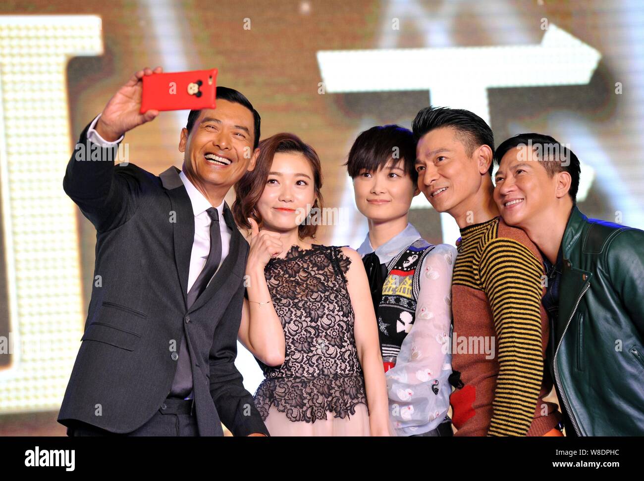 (From left) Hong Kong actor Chow Yun-fat, Chinese actress and hostess ...