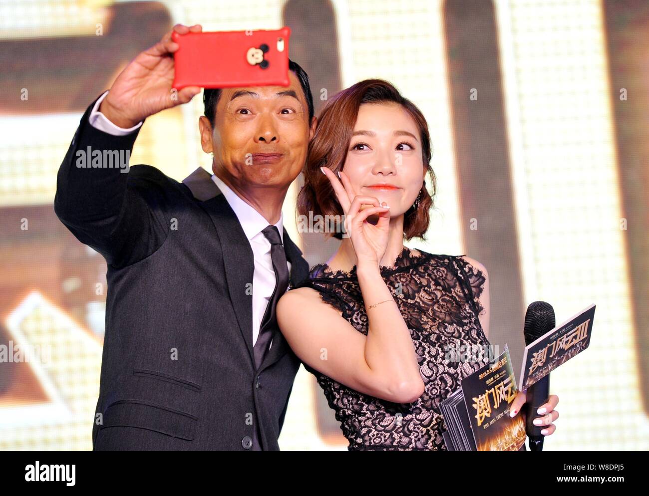 Hong Kong actor Chow Yun-fat, left, Chinese actress and hostess Yu ...