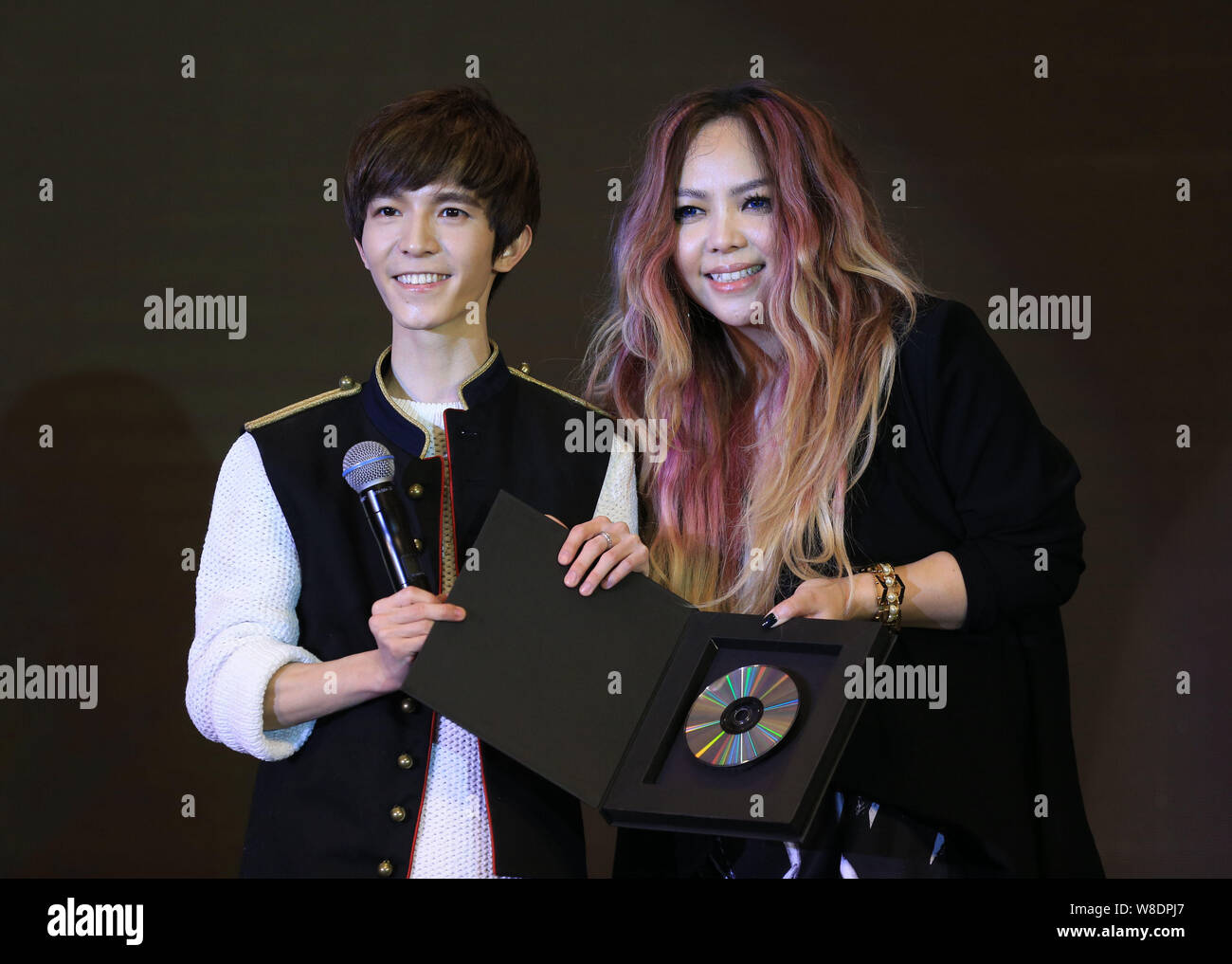 Taiwanese singer A Mei, right, poses with Chinese author and writer Guo ...