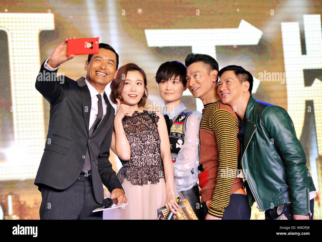 (From left) Hong Kong actor Chow Yun-fat, Chinese actress and hostess ...