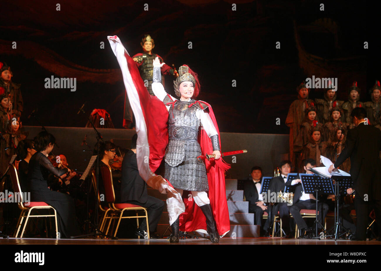 --FILE--An actress and the orchestra of the PLA (People's Liberation ...