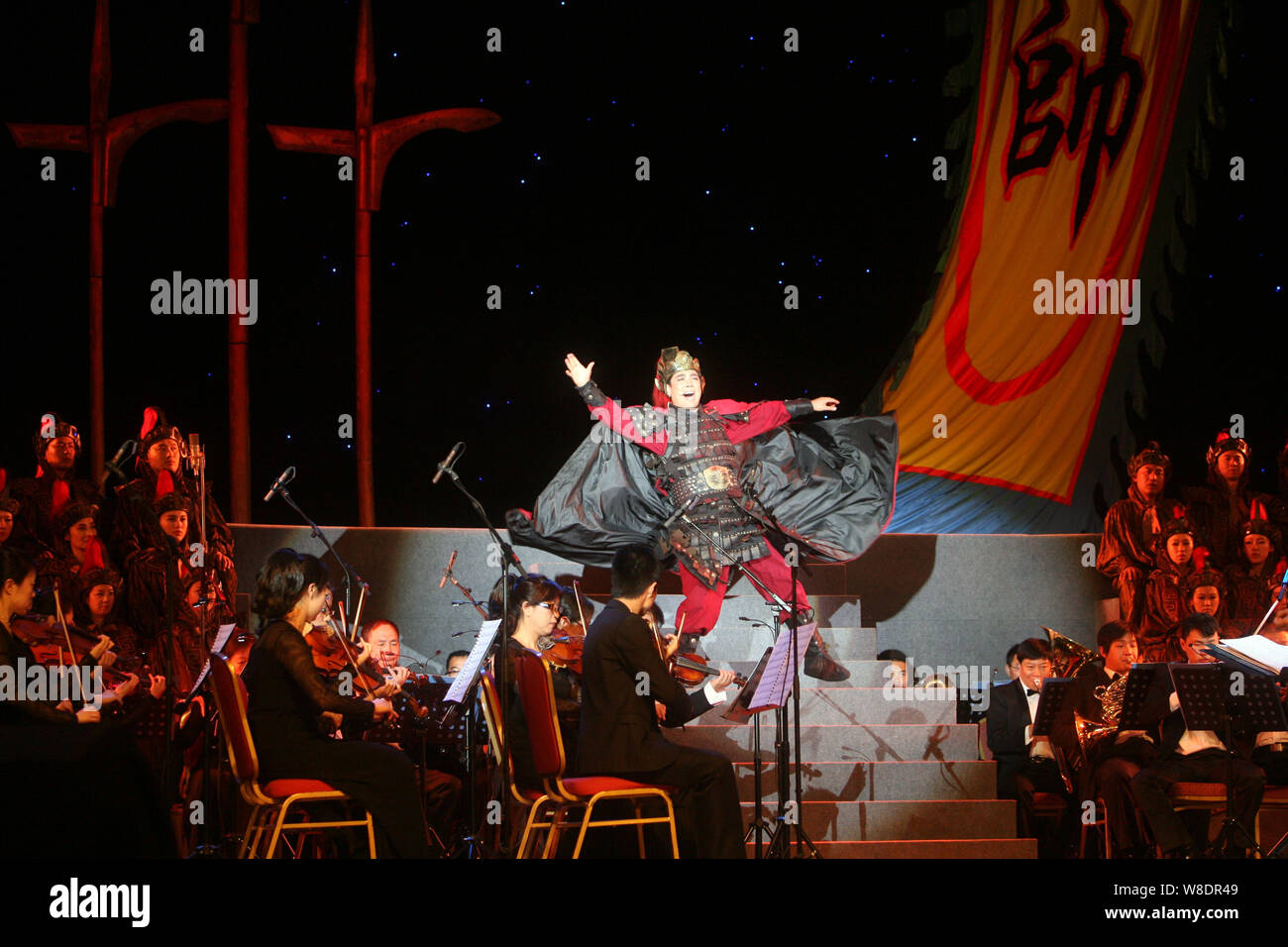 --FILE--An actress and the orchestra of the PLA (People's Liberation ...