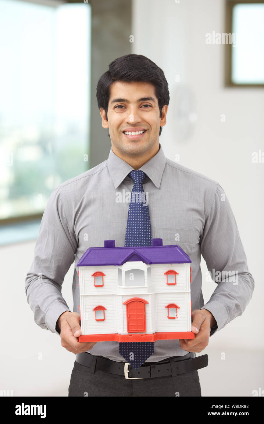 Corporate man miniature hi-res stock photography and images - Alamy