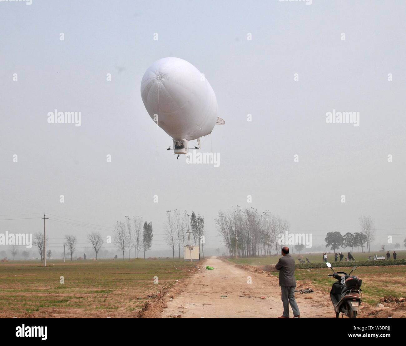 The zeppelin made by Chinese farmer Shi Songbo takes off during first ...