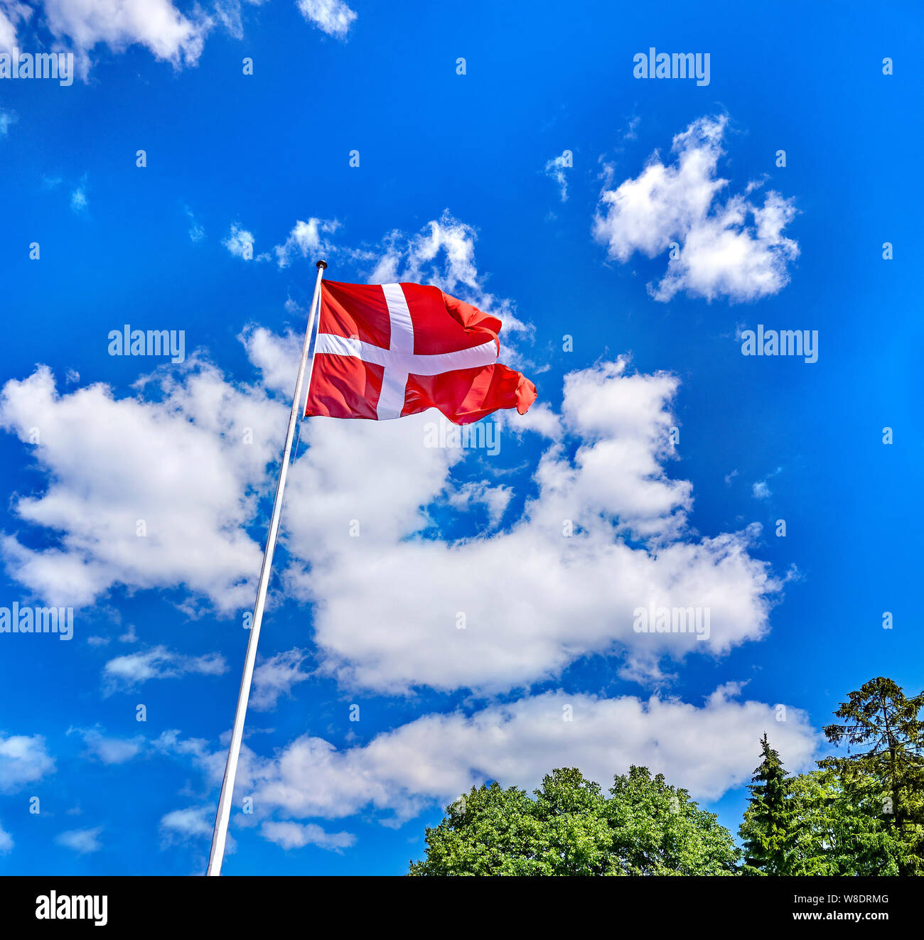Blue sky background with denmark flag hi-res stock photography and ...