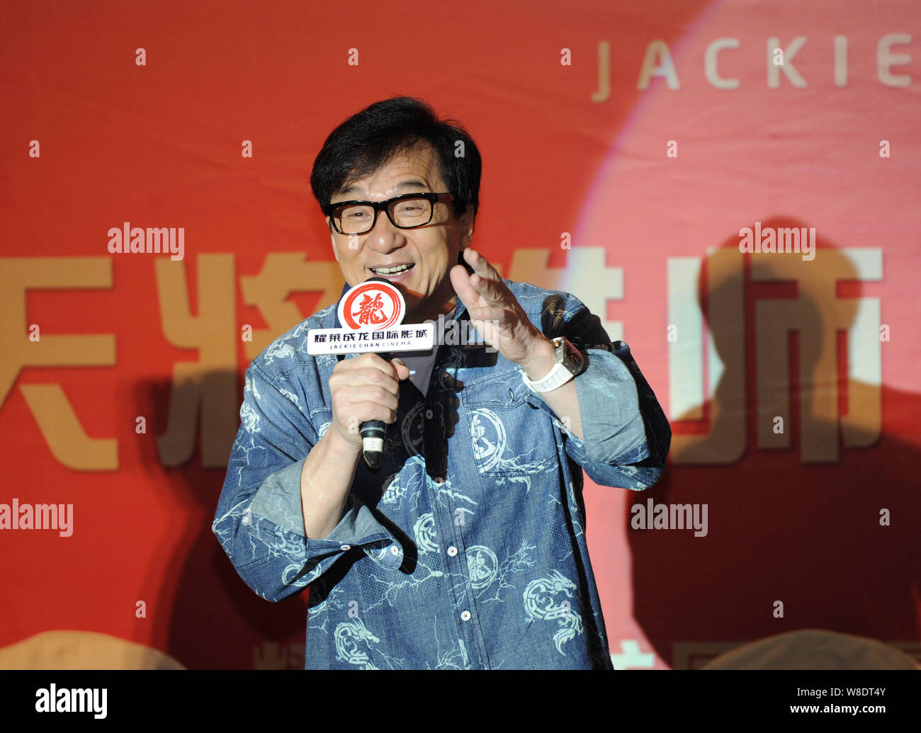 Hong Kong kungfu superstar Jackie Chan smiles during a fan meeting for ...