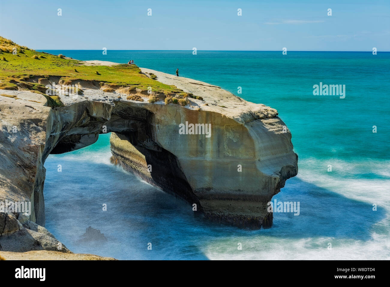 The Arch at the splendid Tunnel Beach with the amazing colours and ...