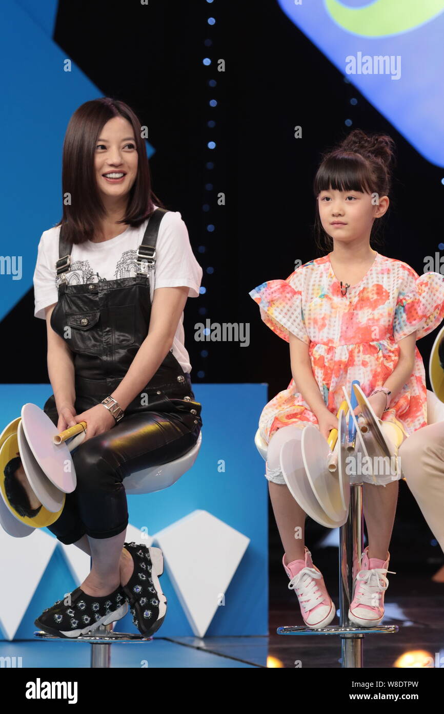 Chinese actress Vicki Zhao Wei, left, speaks next to child star Ji ...