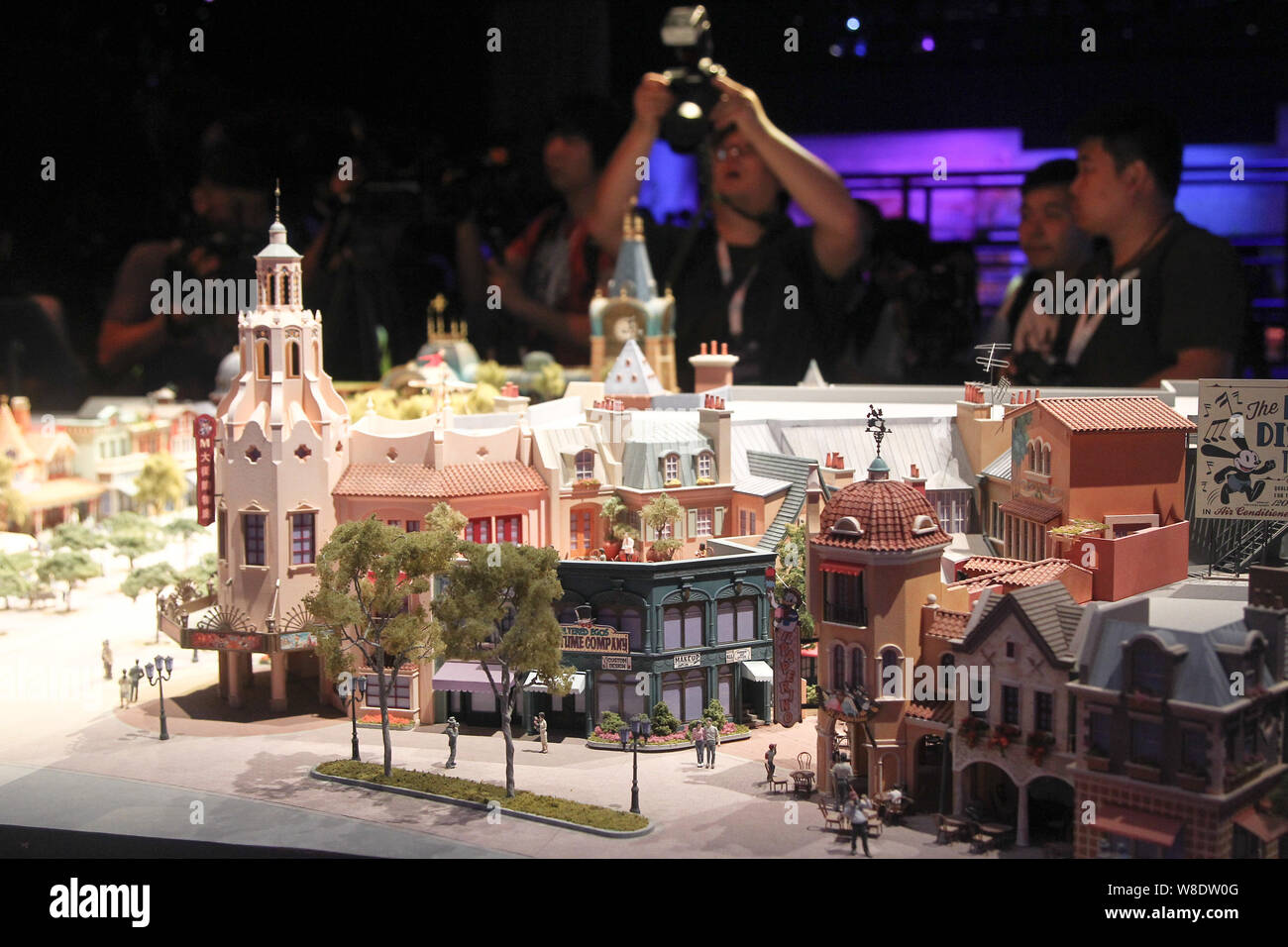 A scale model of the Shanghai Disney Resort is on display during its ...