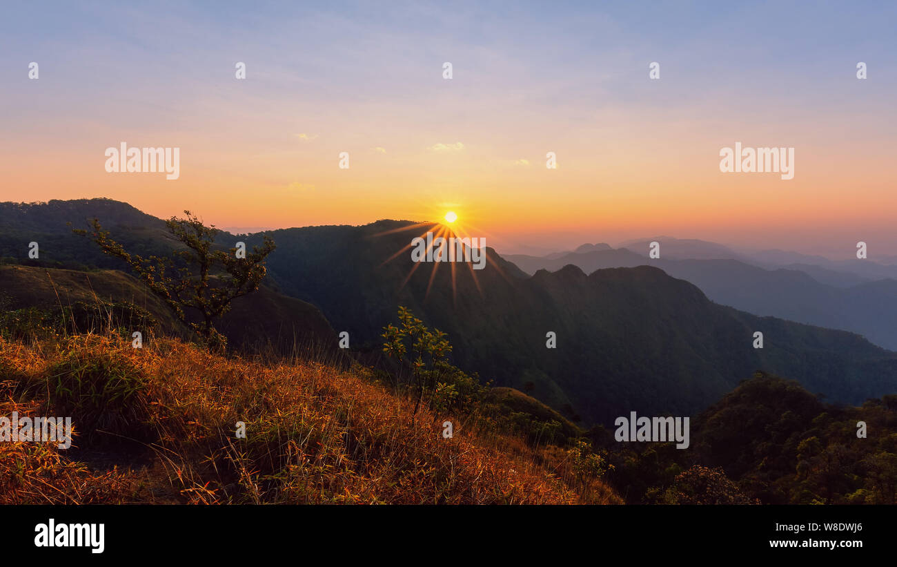 Colorful sunset in the mountains landscape. Dramatic overcast sky Stock ...