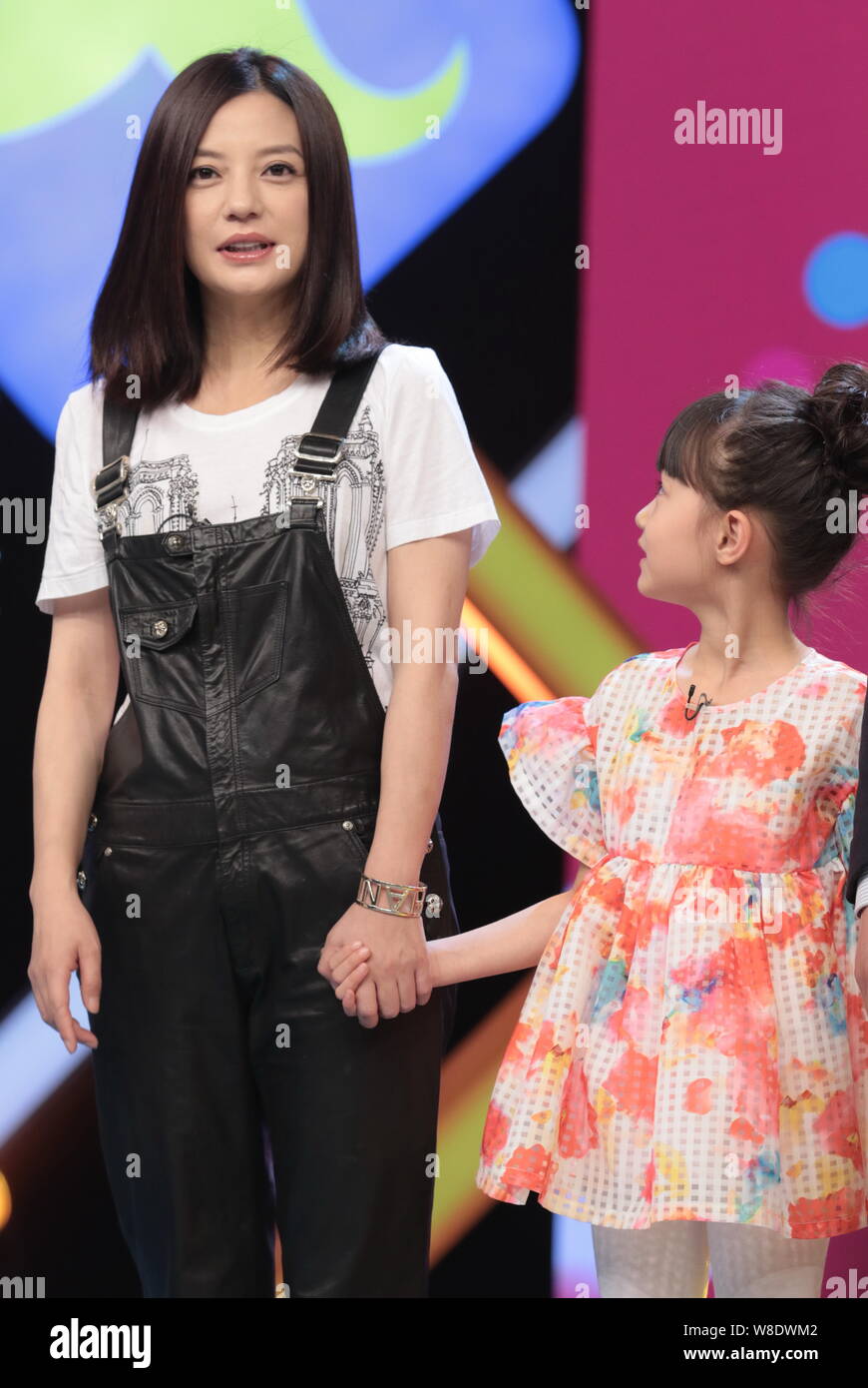 Chinese actress Vicki Zhao Wei, left, speaks next to child star Ji ...