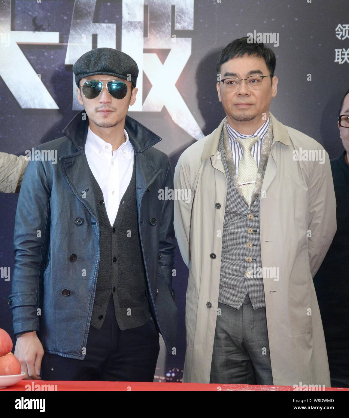 Hong Kong actors Nicholas Tse, left, and Sean Lau pose during a press ...