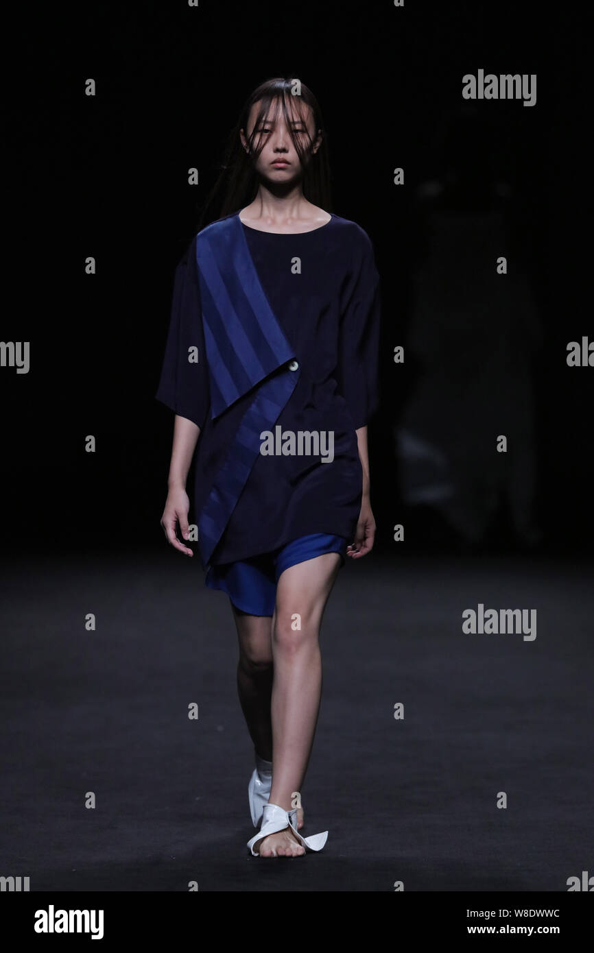 A model displays a new creation at the JUST FOR TEE X Pepsi fashion ...